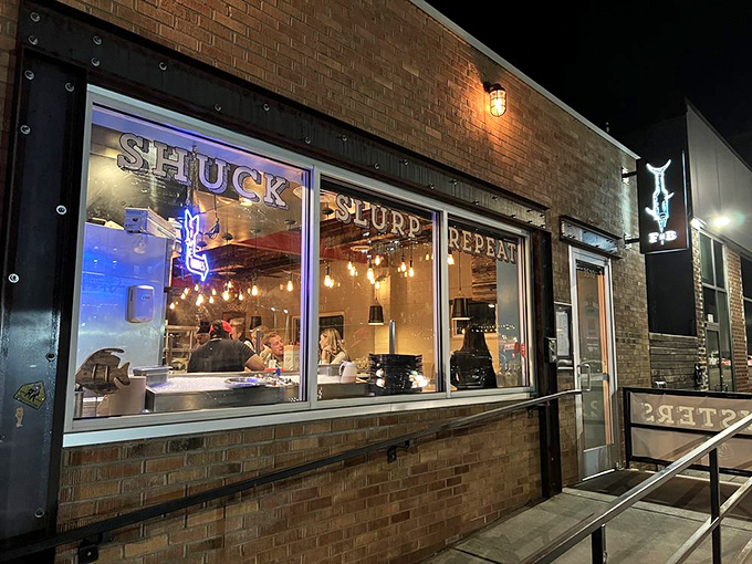 When the evening lights hit this brick beauty, you know something delicious is happening inside.