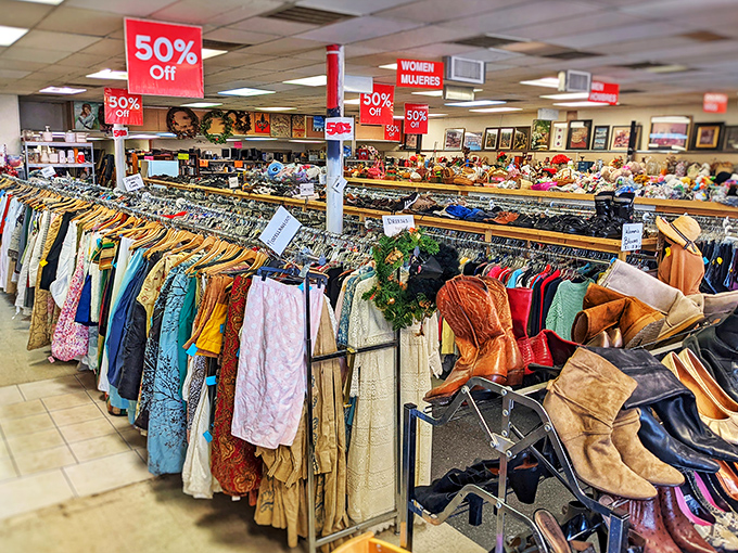 Rows of organized clothing racks stretch like a rainbow of possibilities - thrift shopping has never looked so appealing.