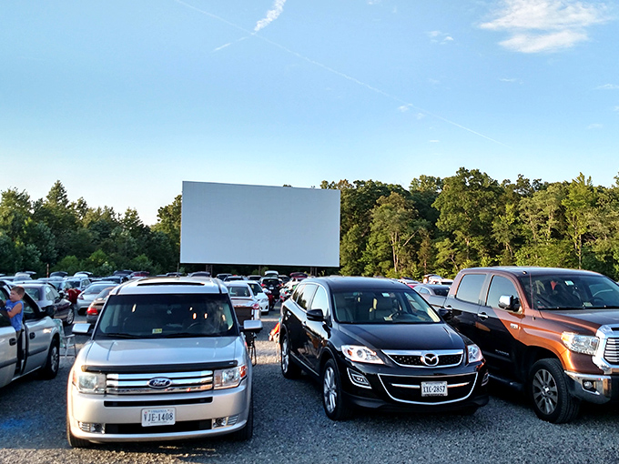 Cars perfectly positioned like puzzle pieces, waiting for darkness to fall and the feature to begin at Goochland Drive-In.