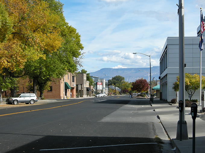 Mountain vistas frame this downtown where your grocery budget breathes as easily as the fresh Colorado air.