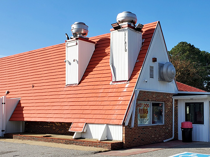 Gus's distinctive roof could double as an air traffic control signal, guiding hungry pilots straight to hot dog paradise.