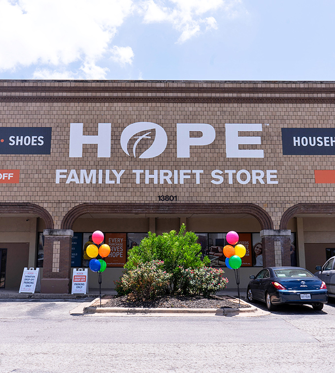 Sunshine, blue skies, and rainbow balloons welcome you to bargain heaven. This brick facade hides a wonderland of pre-loved treasures.