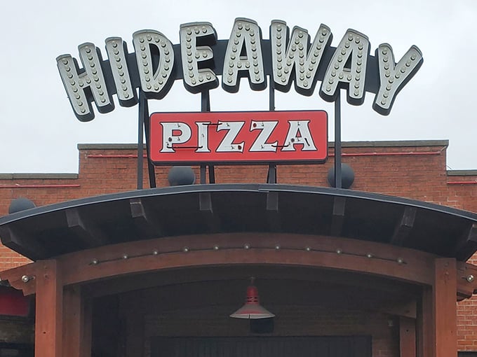 That illuminated sign isn't just advertising&mdash;it's a local landmark promising pizza perfection. Hideaway has been lighting up Tulsa's taste buds for decades.