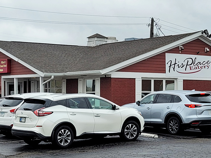 His Place Eatery's brick-red exterior promises comfort food that hugs your soul before it even hits your plate.