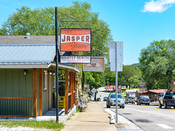 Local businesses line this quiet street where neighbors still wave and everyone knows the best fishing spots around.