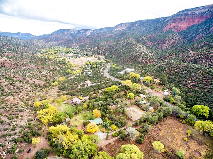 The verdant valley of Jemez Springs unfolds like nature's quilt, stitched together with winding roads and mountain shadows.
