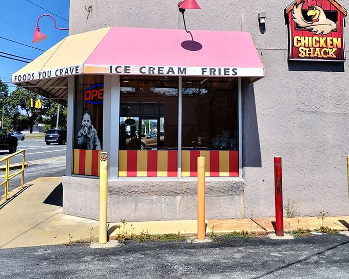 The cheerful awning beckons like an old friend saying, "Come on in, the chicken's fine!" And trust me, it really is.