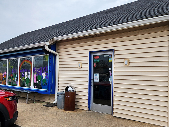 Those colorful painted windows hint at the creativity inside. Lazy Mike's proves great sandwiches don't need fancy surroundings.