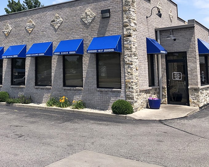 Blue awnings and simple signage - Louie's doesn't need flash when the dogs speak for themselves.