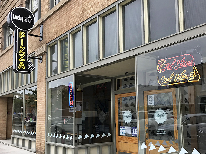 When a pizzeria puts "Good Vibes" in neon, you know they're serving more than just food.