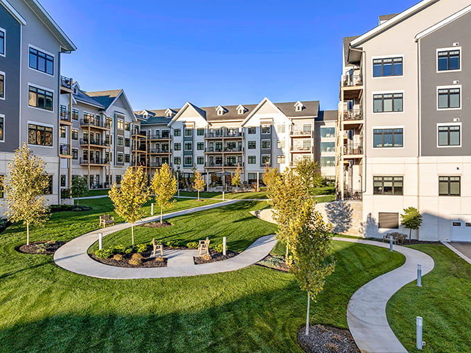 Contemporary design meets Kansas practicality in this welcoming Prairie Village community that feels like home.