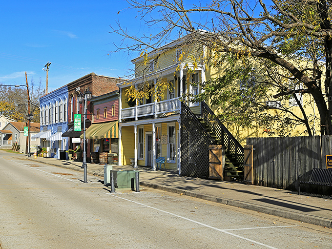 That bright yellow building practically winks at you, surrounded by neighbors dressed in their Sunday best colors.
