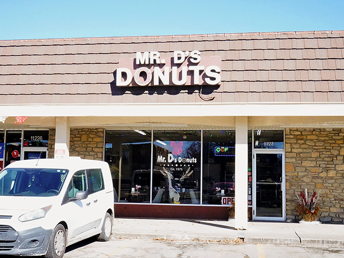 That stone facade might look serious, but the donuts inside are anything but business-as-usual.