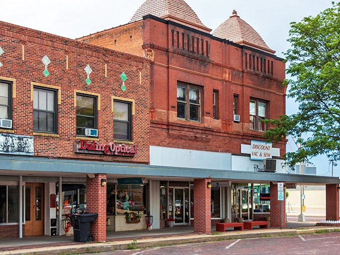 Brick buildings stand tall like sentinels guarding the secret of affordable small-town living in Nebraska.