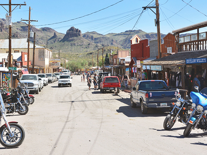 The desert mountains provide a dramatic backdrop to Oatman's dusty main street. You half-expect John Wayne to stroll around the corner.