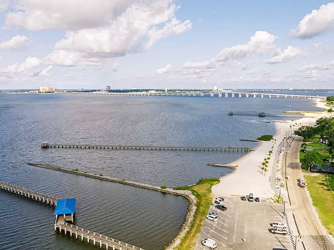 Those coastal waters stretch forever while Bay St. Louis Bridge stands guard, proving that engineered beauty and natural wonder can absolutely share the stage.