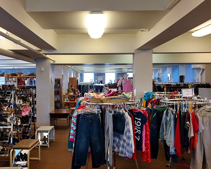 Basement shopping never looked so good &ndash; spacious racks and bright lighting transform thrifting into retail therapy.
