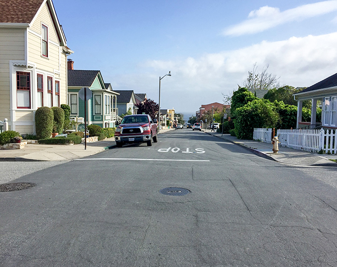 The charming homes of Pacific Grove stand like colorful sentinels, guarding some of California's most breathtaking coastline.