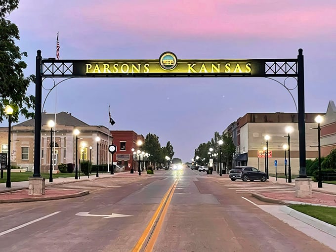 Twilight's embrace! Parsons' illuminated gateway glows like a Hallmark movie set, where every streetlight promises small-town secrets and warm pie.