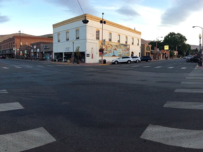 Sunset gilds Prosser's historic corner building, painting it with hues that rival their famous local wines.