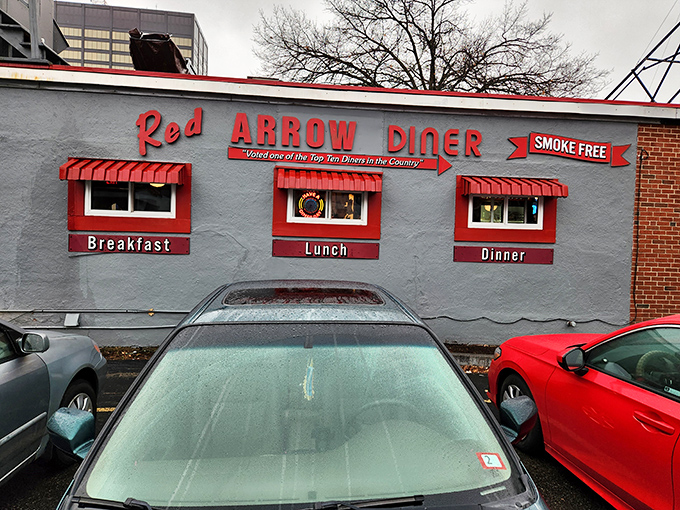 Red brick meets retro charm where Manchester's night owls and early birds gather for timeless comfort food classics.