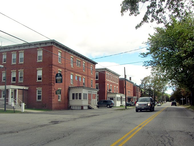 Classic brick buildings line Rumford's downtown, where your dollar stretches further than your weekend hiking plans.