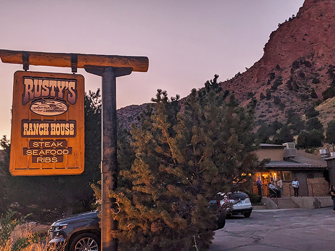 That wooden sign promises steak, seafood, and ribs - the holy trinity of carnivorous happiness.