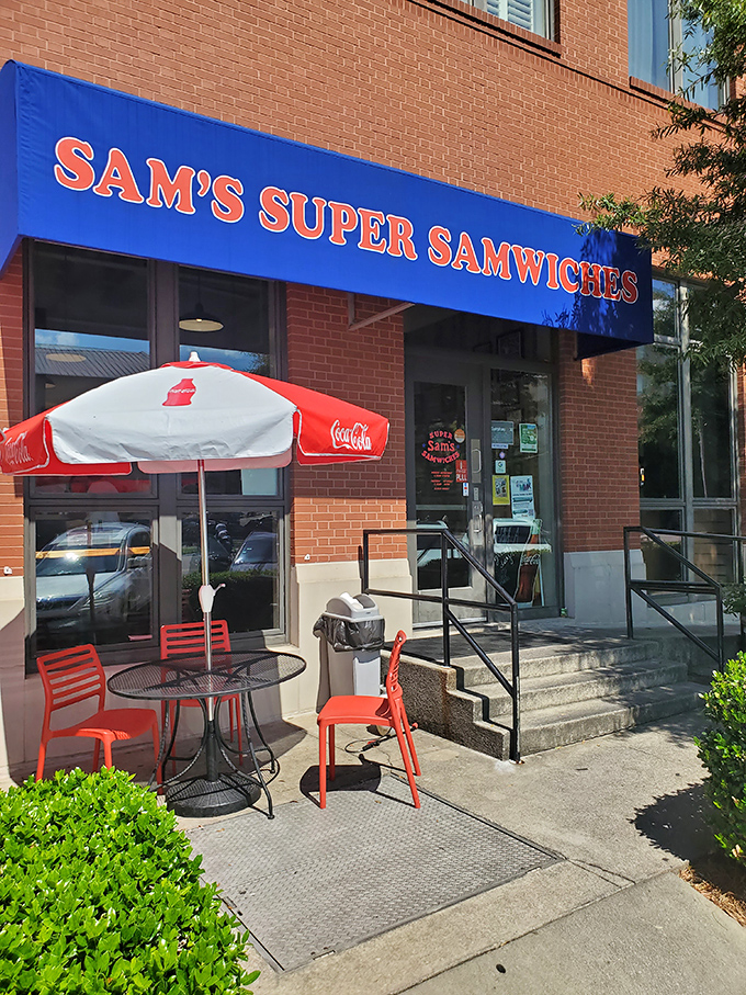 Red chairs, Coca-Cola umbrellas, and sandwiches worth writing home about&mdash;Sam's keeps it deliciously simple.