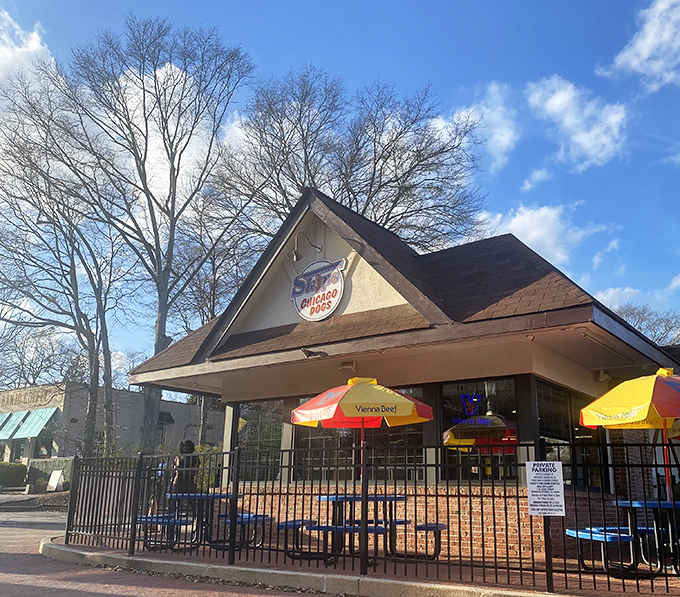 Classic brick meets modern comfort, where every seat offers a front-row view to hot dog heaven.