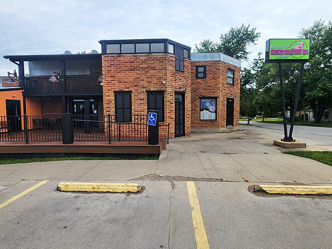 A brick facade with a splash of green announces BBQ paradise. Smoked Creations looks like what would happen if your backyard grill grew up and got famous.