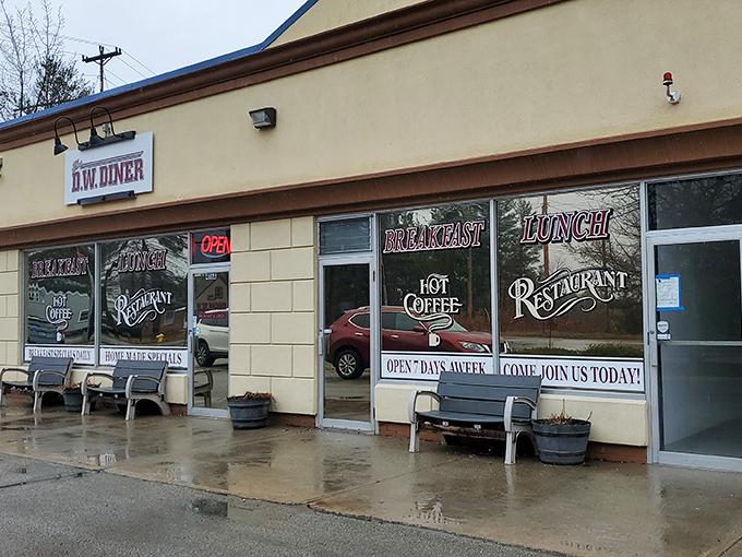 Rain-slicked sidewalks lead to D.W. Diner's welcoming entrance. Inside, the coffee's hot and the conversation's warmer.