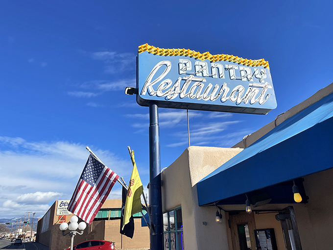 Blue skies and blue signage&mdash;The Pantry stands ready to transform your morning with chile-laden breakfast magic.