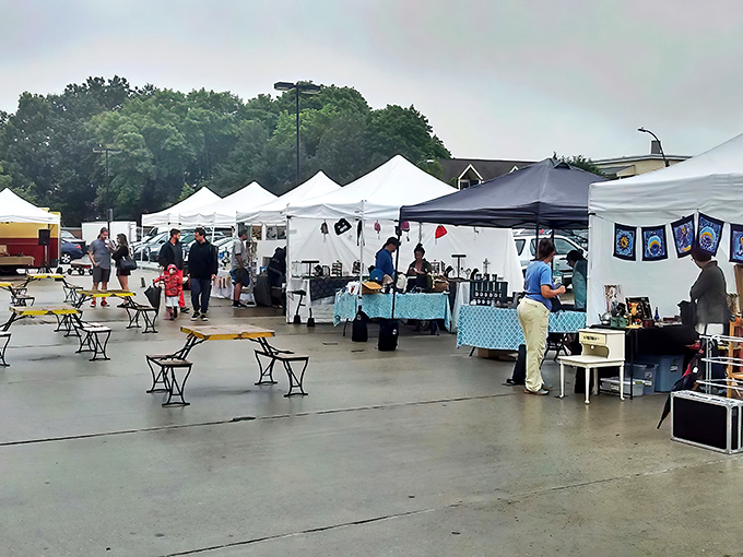 The organized chaos of outdoor flea market life - where one person's clutter becomes another's perfect find.