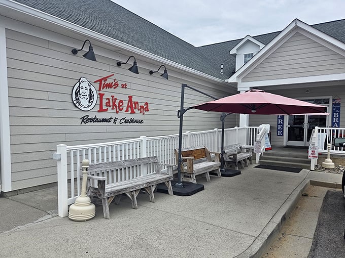 The welcoming entrance to Tim's promises lake views and seafood that tastes like it was caught five minutes ago.