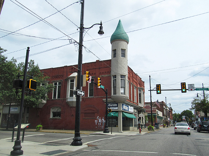 That distinctive tower stands guard over a community where neighbors still wave and bills stay manageable.