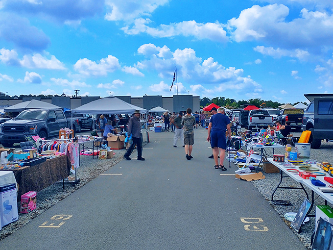 Early birds get the deals! Morning shoppers browse through colorful displays of merchandise at Trader Jack's bustling outdoor market.