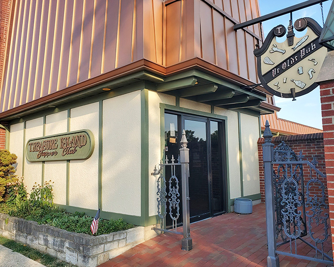 Sunset casts a golden glow on Treasure Island's entrance. Even the building seems to know it's dinner time.