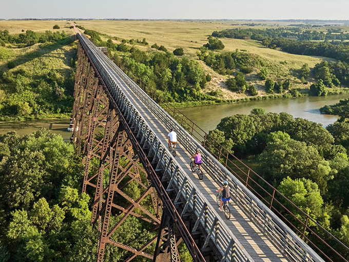 Classic railroad bridge spans generations, connecting past adventures to present-day affordable living dreams.