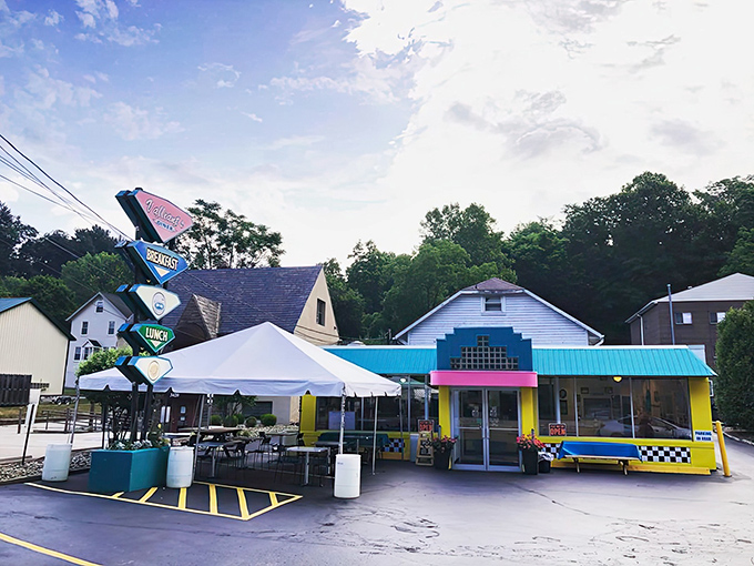The neon-bright facade of Valliant's stands ready for its Hollywood close-up, complete with those checkered benches for post-milkshake digesting.
