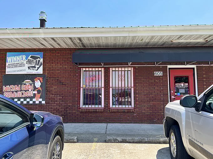 Award-winning sandwiches await behind these humble windows. The "Winner" sign isn't just for show!