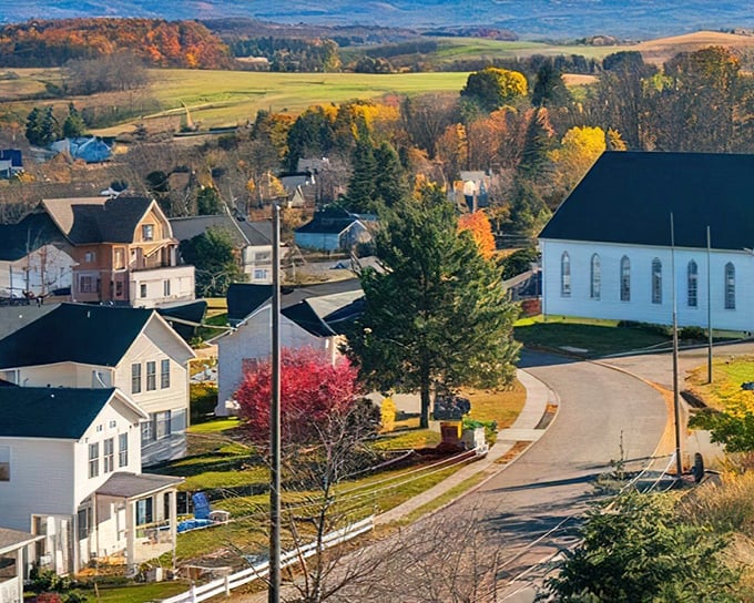 Rolling hills embrace this peaceful community where neighbors still wave and groceries don't require a loan.