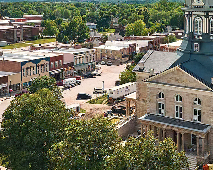 Historic downtown buildings line up like old friends, each brick telling stories of simpler, sweeter times.