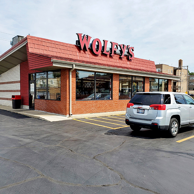 This isn't just a hot dog stand, it's a time machine with fries! Wolfy's vintage charm has been feeding Chicago memories for generations.