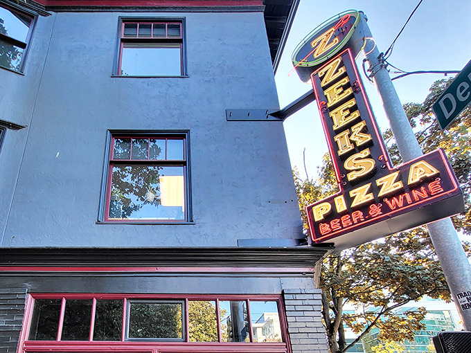 Corner spots like this become neighborhood legends, drawing pizza pilgrims from across the bustling city streets.