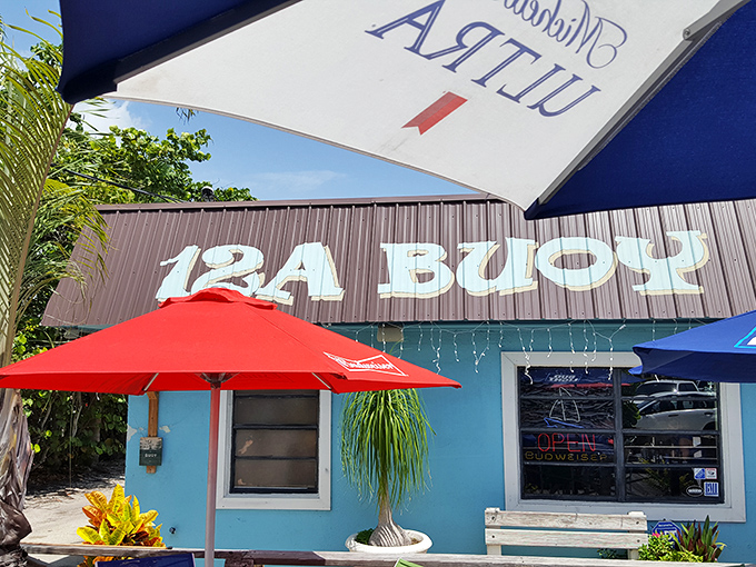 12A Buoy's vibrant blue exterior promises seafood treasures inside. This local favorite serves catches so fresh they were practically swimming this morning.