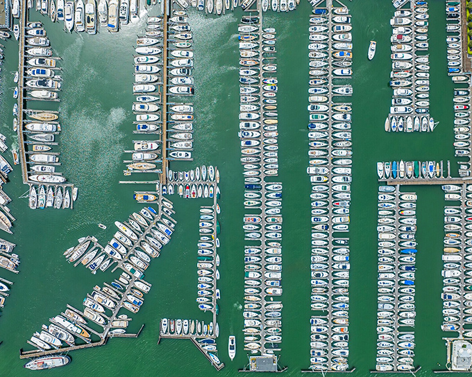 From above, Sausalito's marina resembles an elaborate puzzle of white boats against emerald waters, each vessel with its own story.