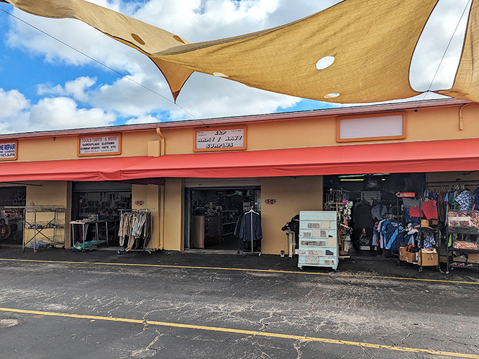 Shade sails and coral-colored storefronts create the perfect backdrop for browsing, where every open doorway promises new possibilities.