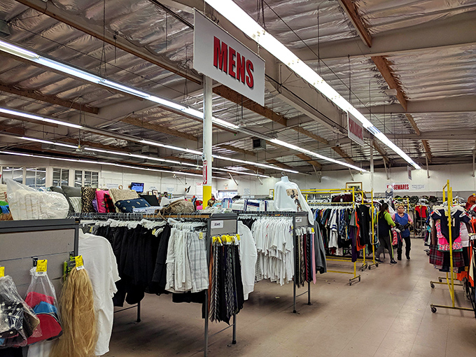 The men's department stretches like an archaeological dig through fashion history, where yesterday's styles await their inevitable comeback.