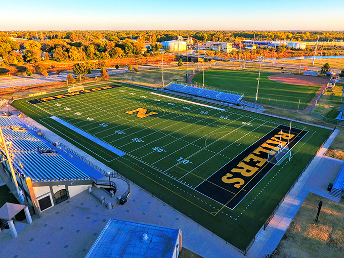 Friday night lights illuminate Fischer Field, where Newton Railers football isn't just a game but the social event of the week.