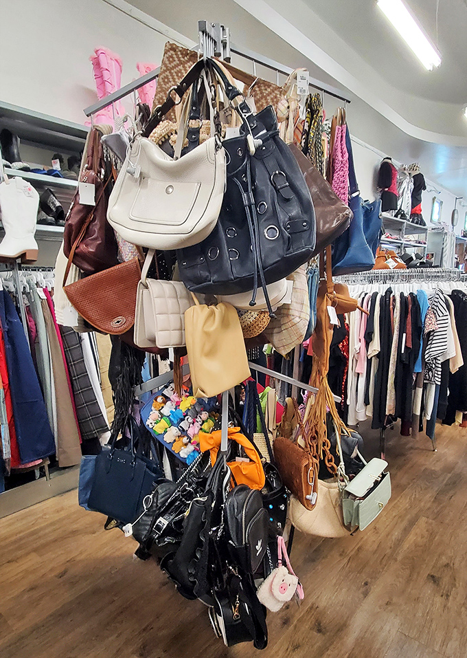 Handbag heaven! This accessory tower showcases everything from designer totes to quirky clutches, all priced less than a fancy dinner.